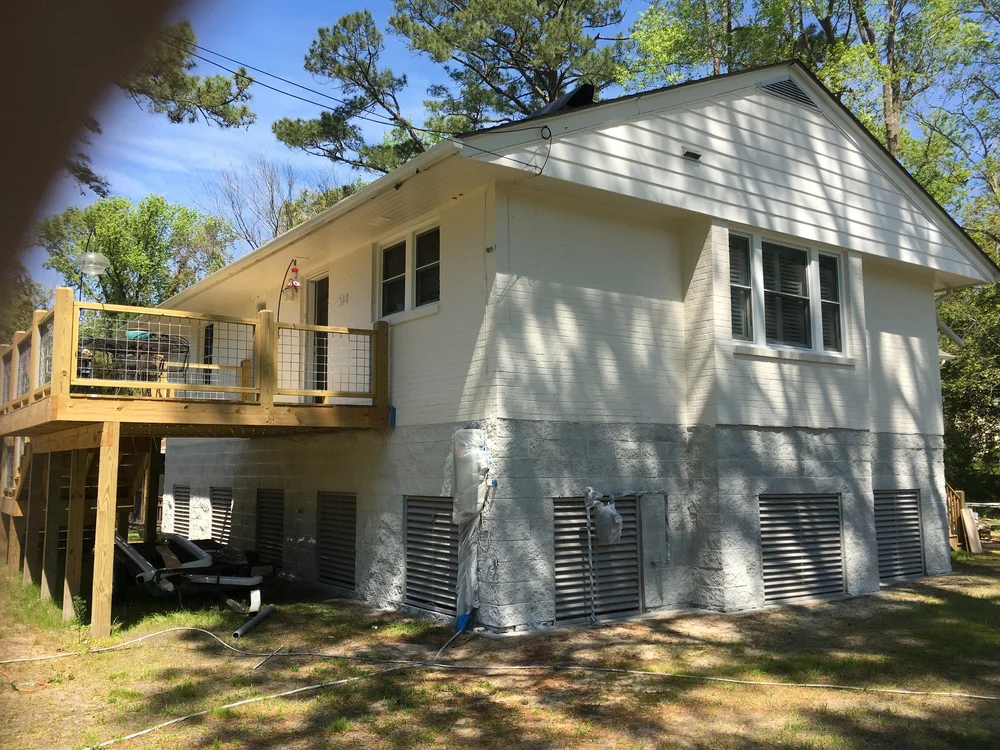 Single Family Dwelling and Structure Raising - Moore Design Build